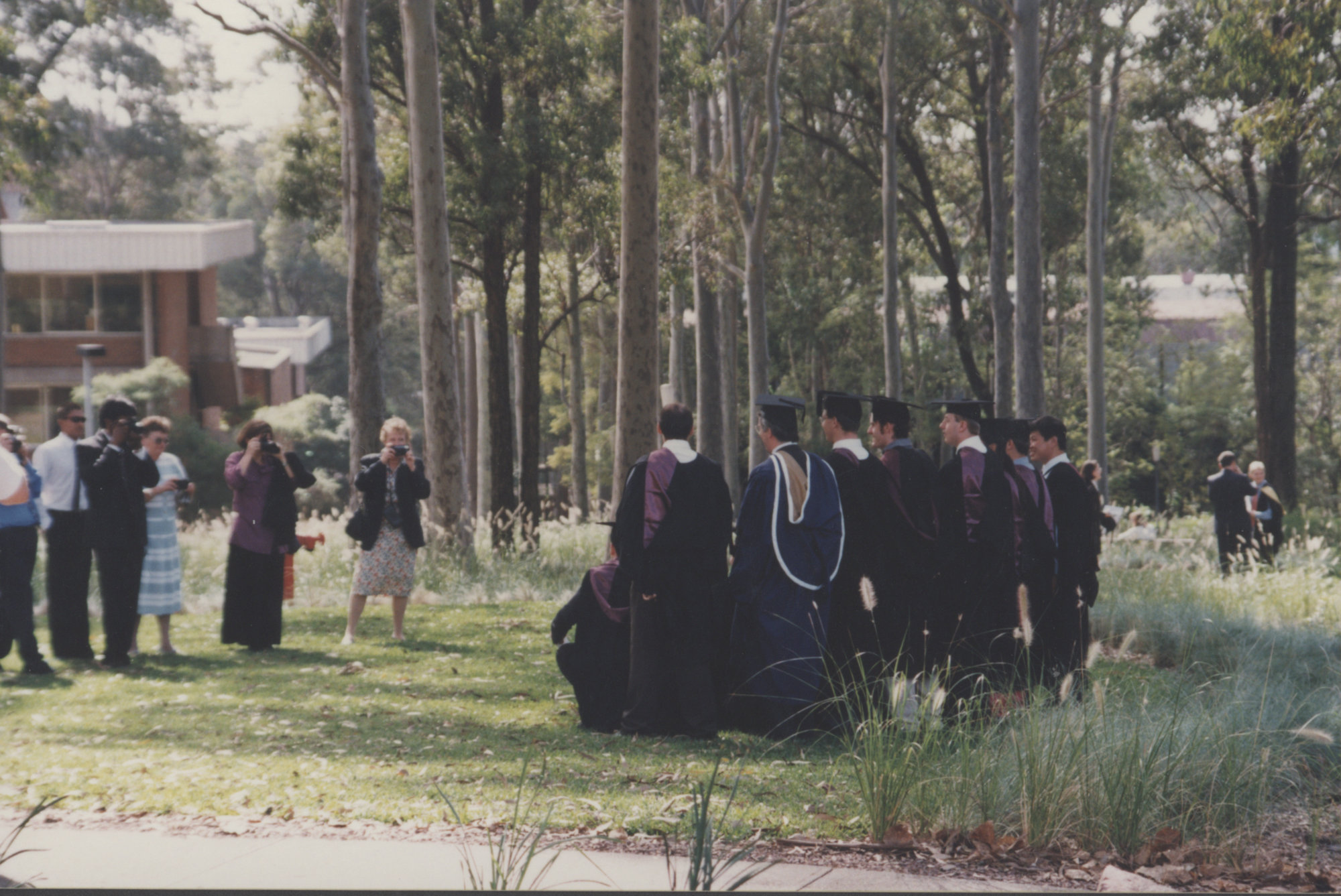 Graduates celebrating their achievement after the Faculty of Law and ...