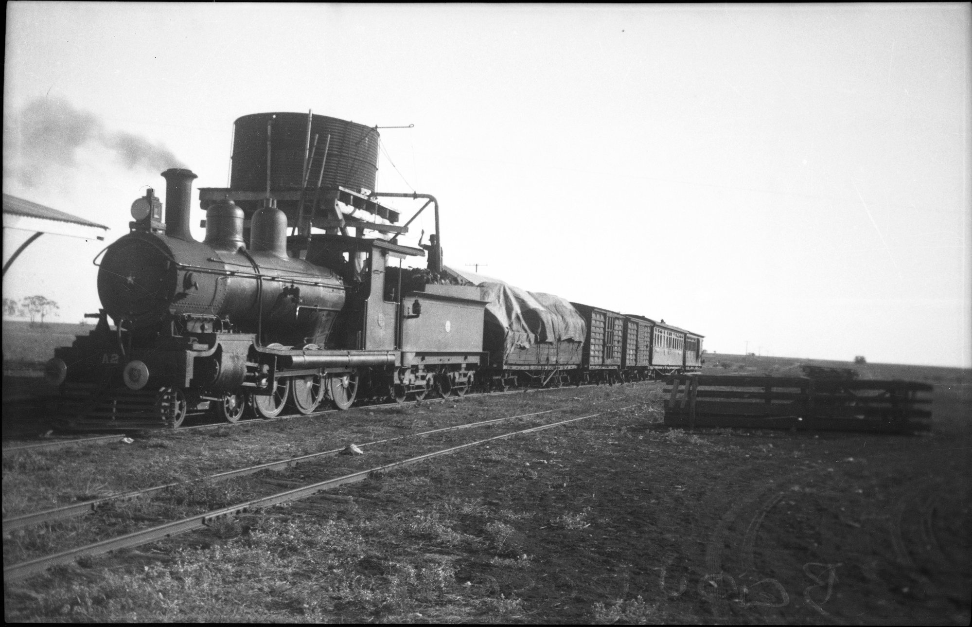 Queensland Railways B15 class, at water tower, unidentified location ...