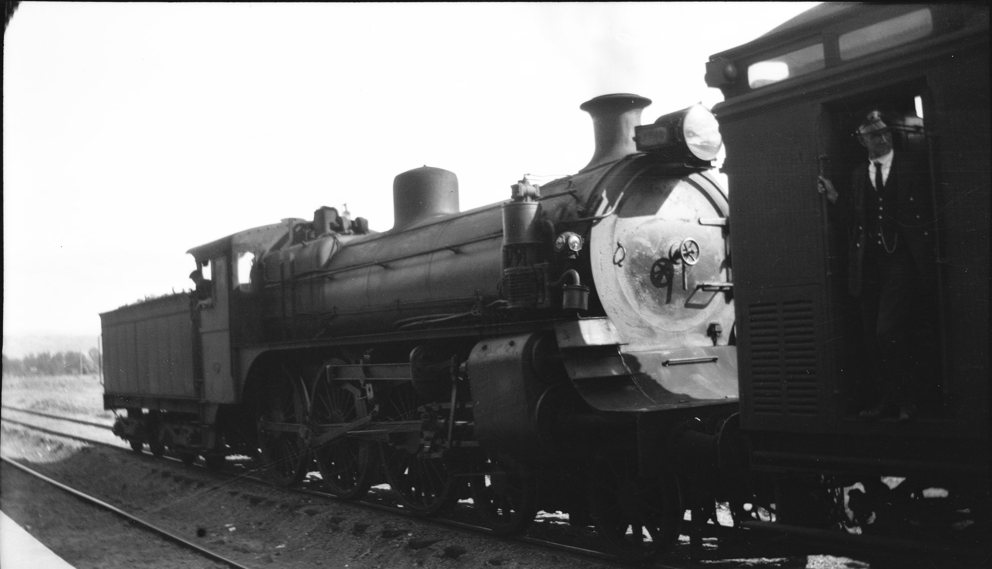 Victorian Railways A2 locomotive, shunting guard's van at unidentified ...