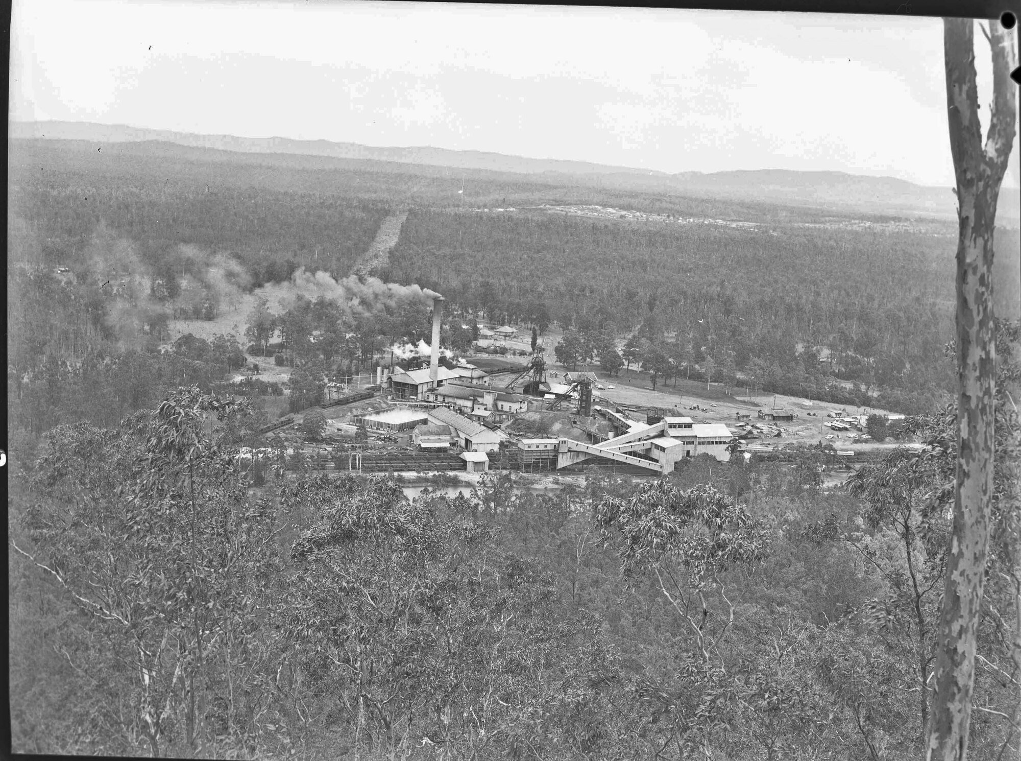 [Coalcliff Colliery], with smoke stack at rural location, NSW, [1958 ...