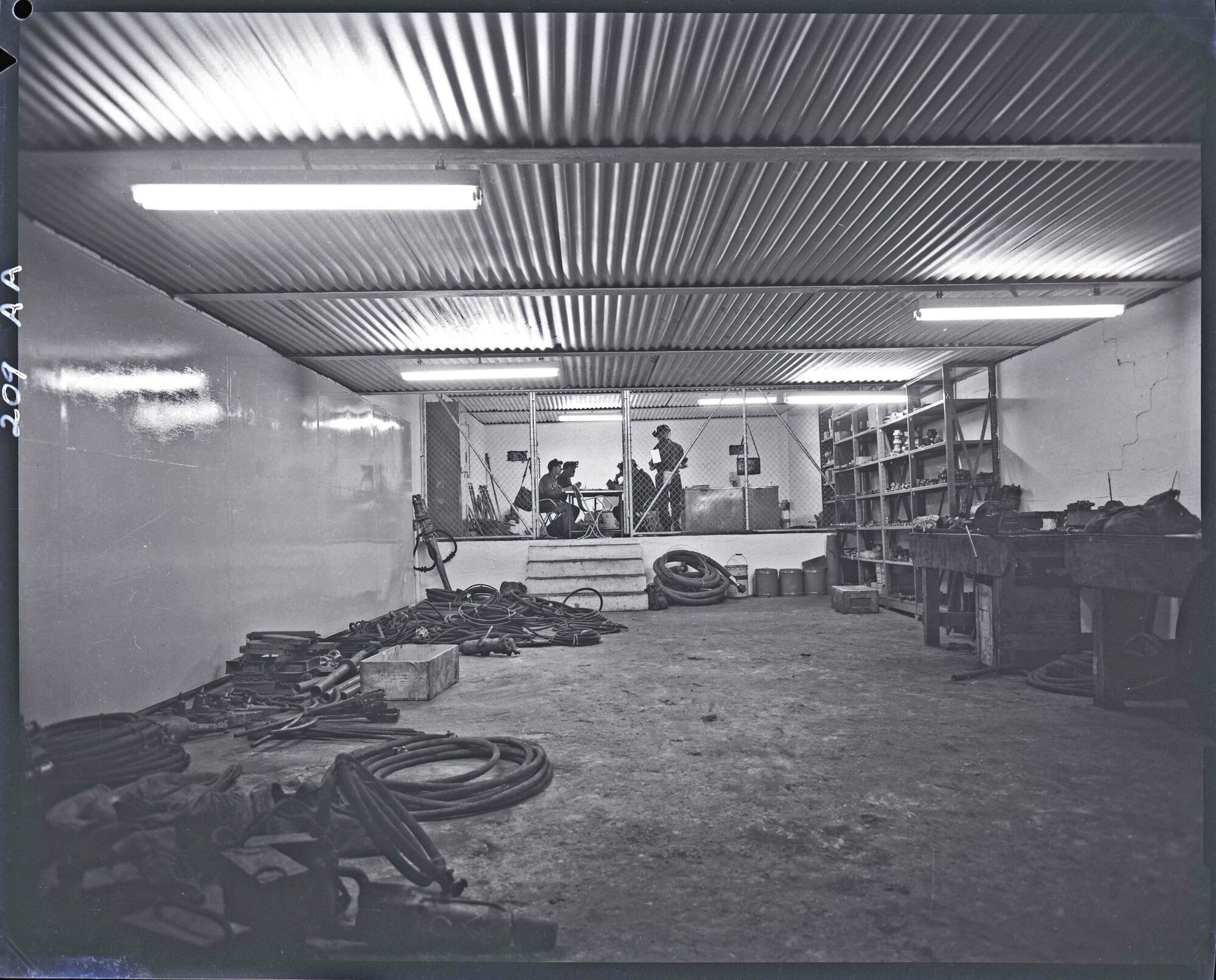 Coalcliff Colliery, miners at a table in caged plant room, NSW, 1959 ...